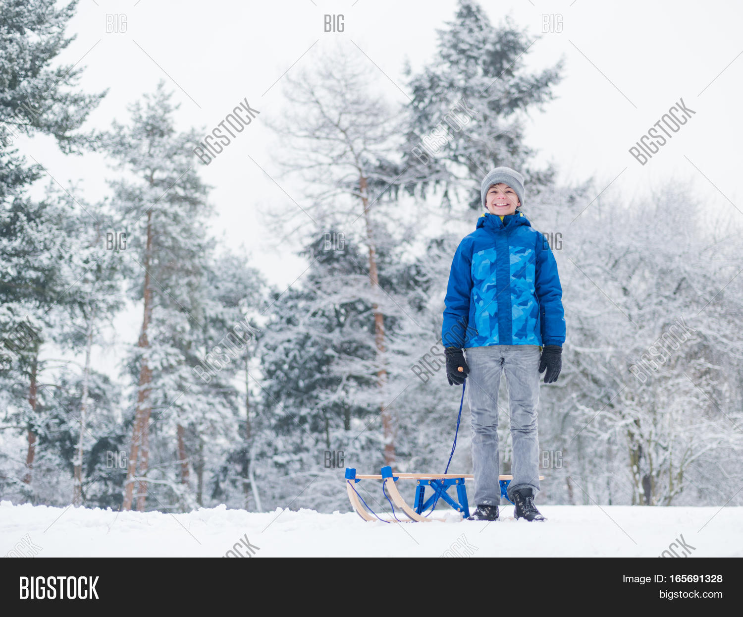 Happy Boy Riding Sled Image & Photo (Free Trial) | Bigstock
