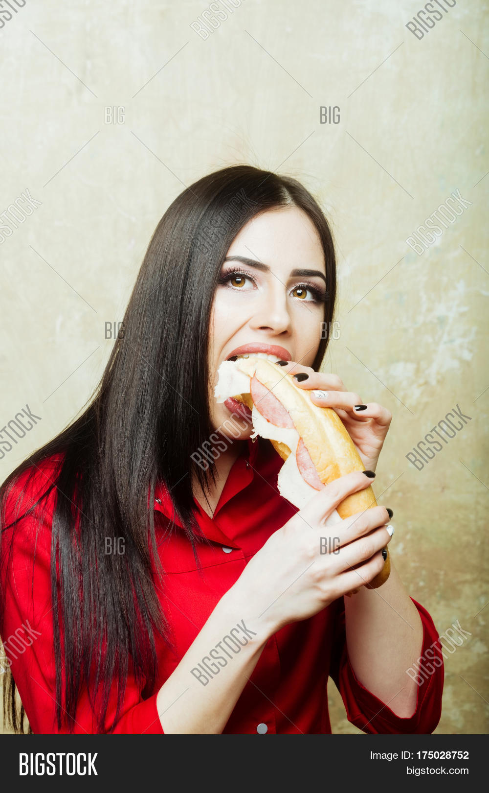 Woman Eating Sausage