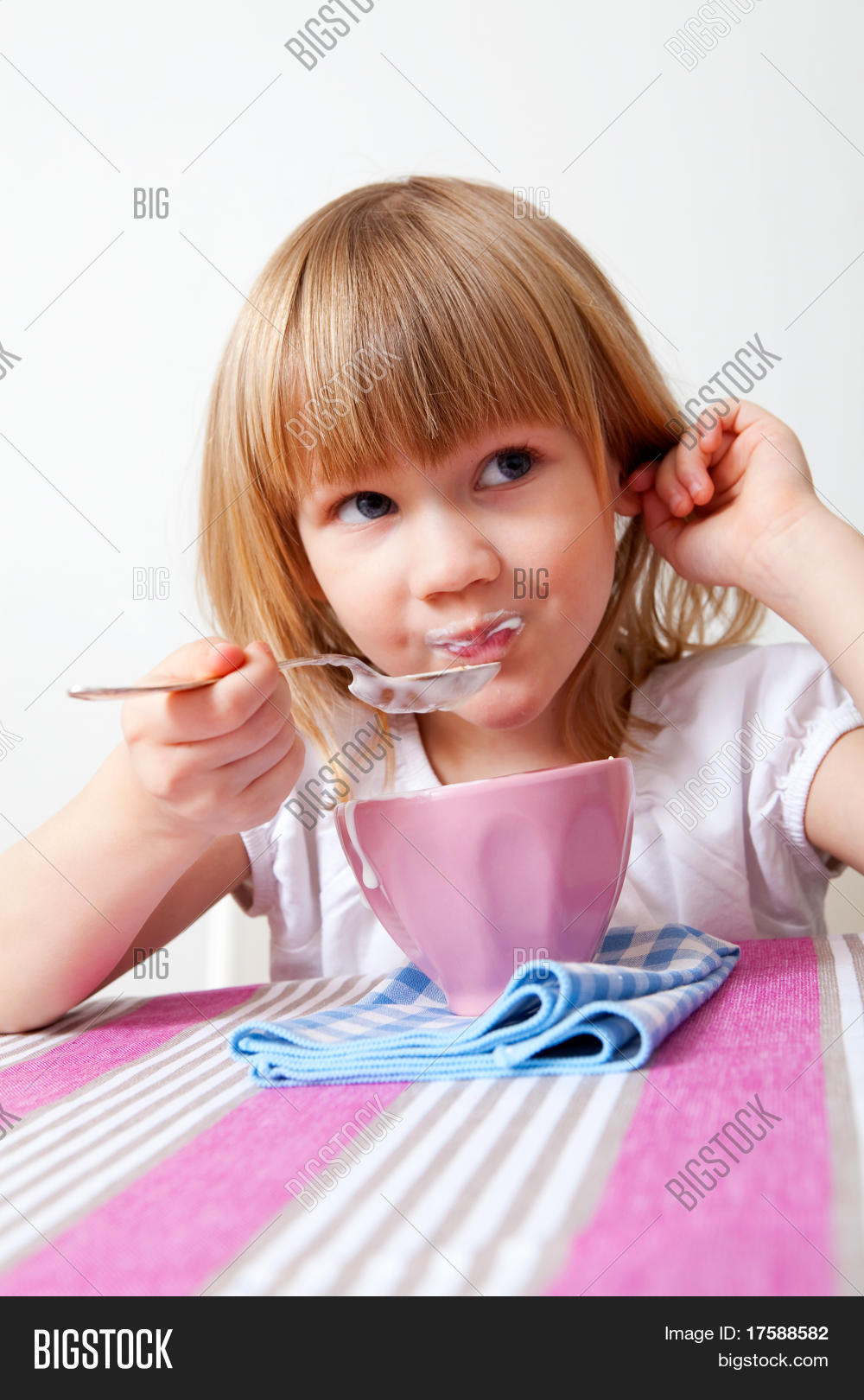 Little Girl Eating Image & Photo (Free Trial) | Bigstock