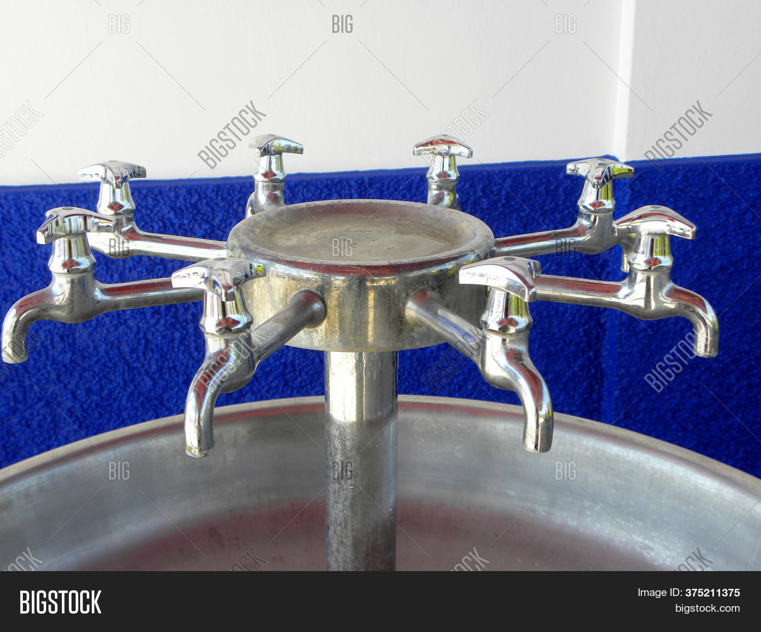 Eight Water Taps Image & Photo (Free Trial) | Bigstock