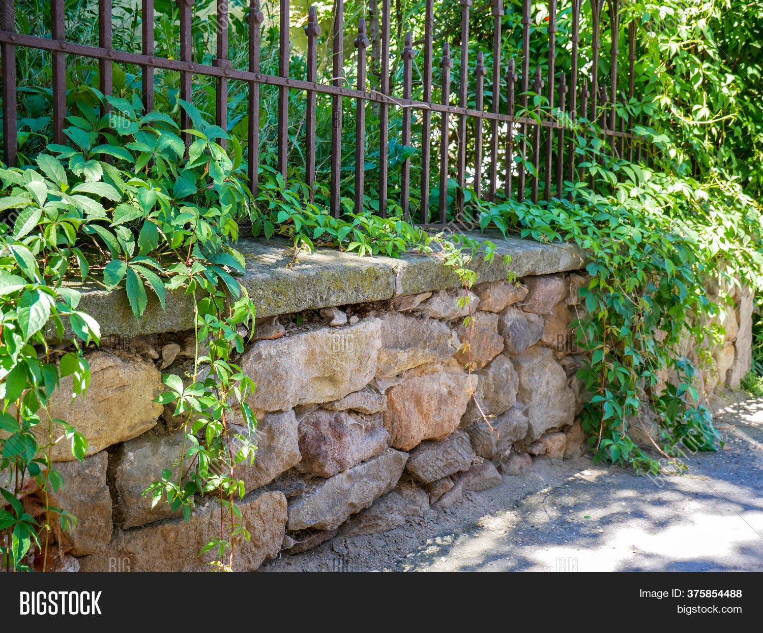 Stone And Iron Fences