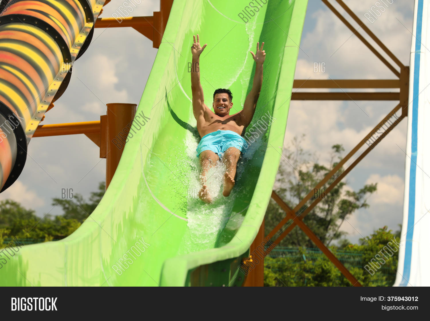 Man On Slide Water Image & Photo (Free Trial) | Bigstock