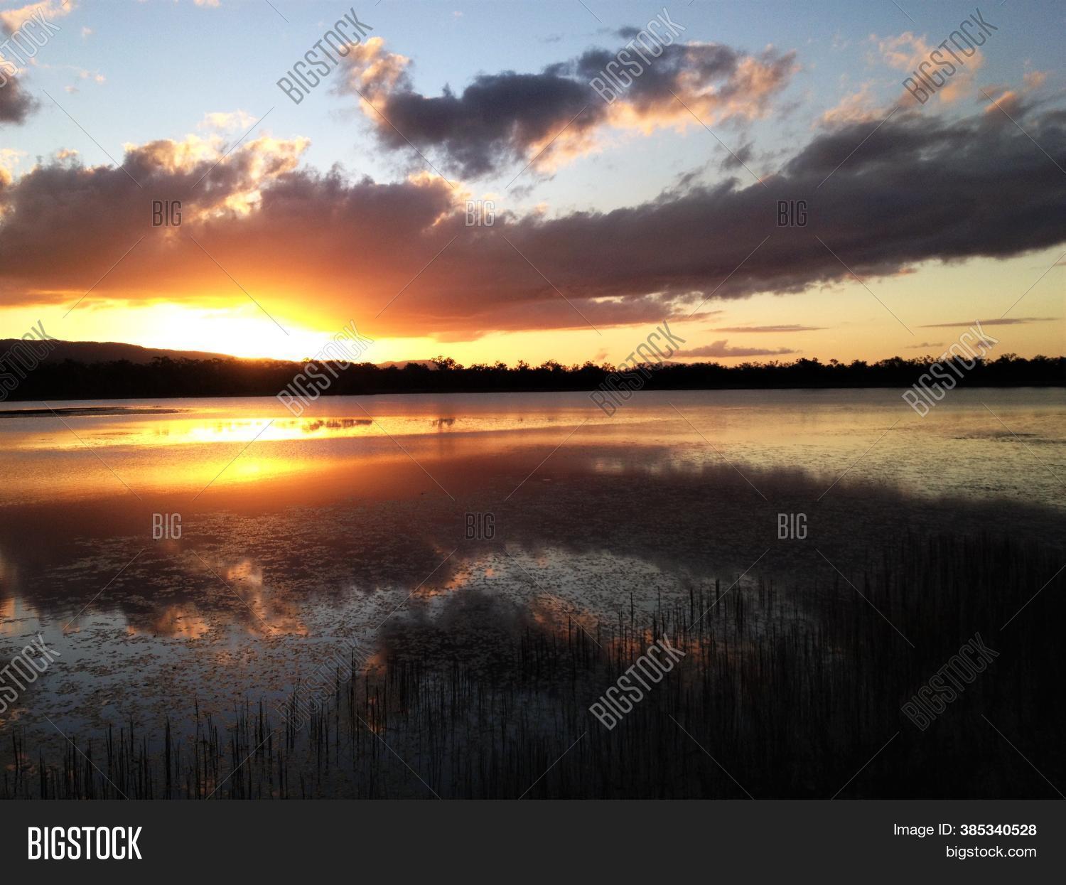 View Sunset Over Lake Image & Photo (Free Trial) | Bigstock
