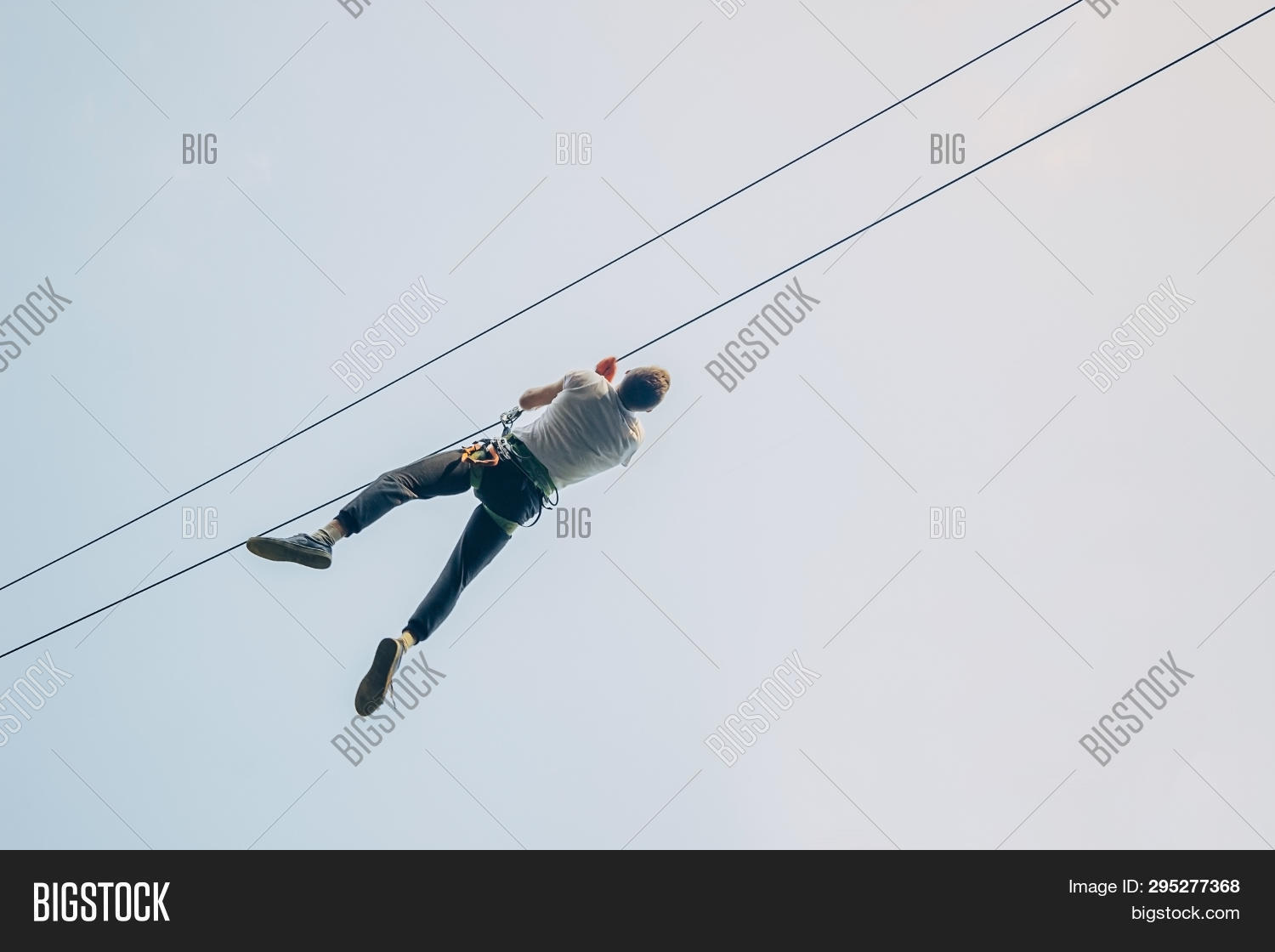 Man Descend On Zip Image & Photo (Free Trial) | Bigstock