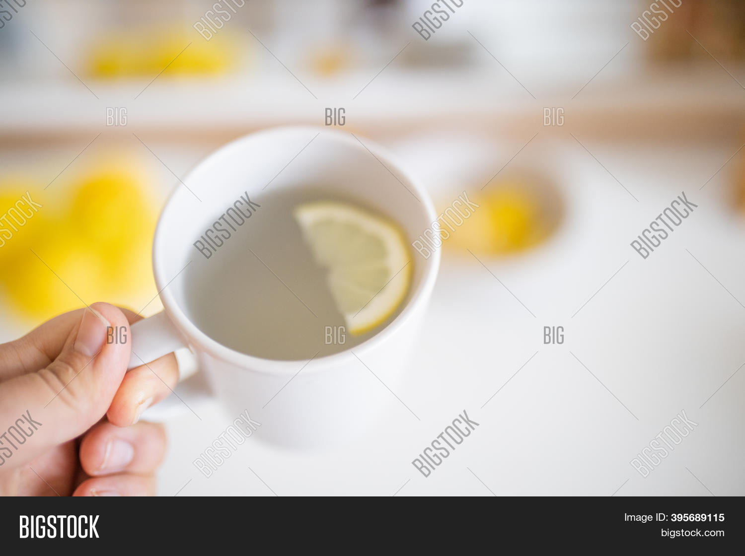 Hand Holding Cup Lemon Image & Photo (Free Trial) | Bigstock