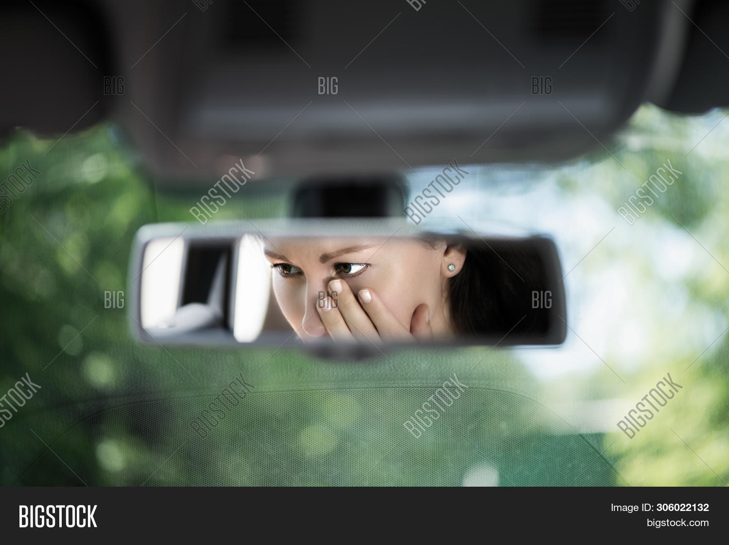 Eyes In Rearview Mirror