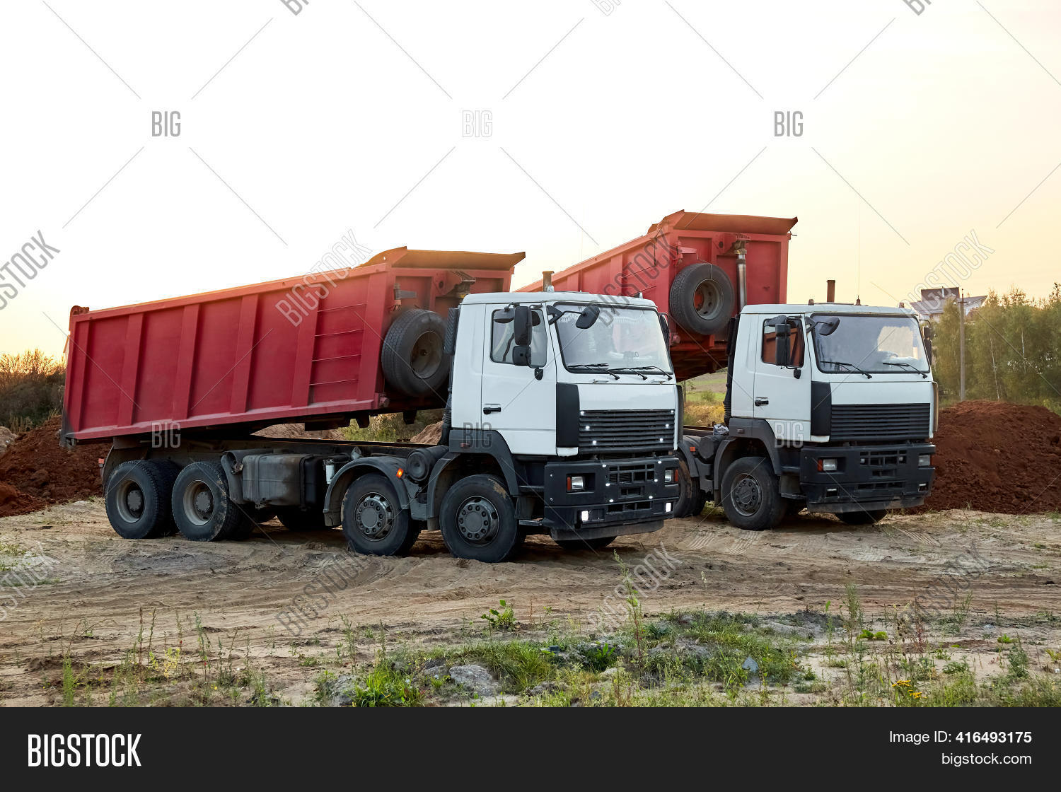 Two Red Dump Trucks Image & Photo (Free Trial) | Bigstock