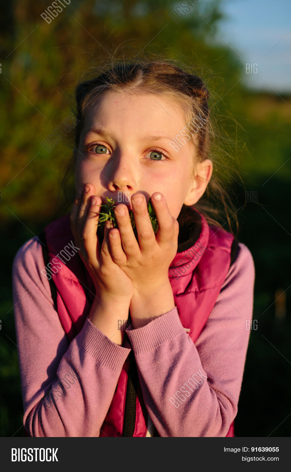 Little Girl Eats Grass Image & Photo (Free Trial) | Bigstock