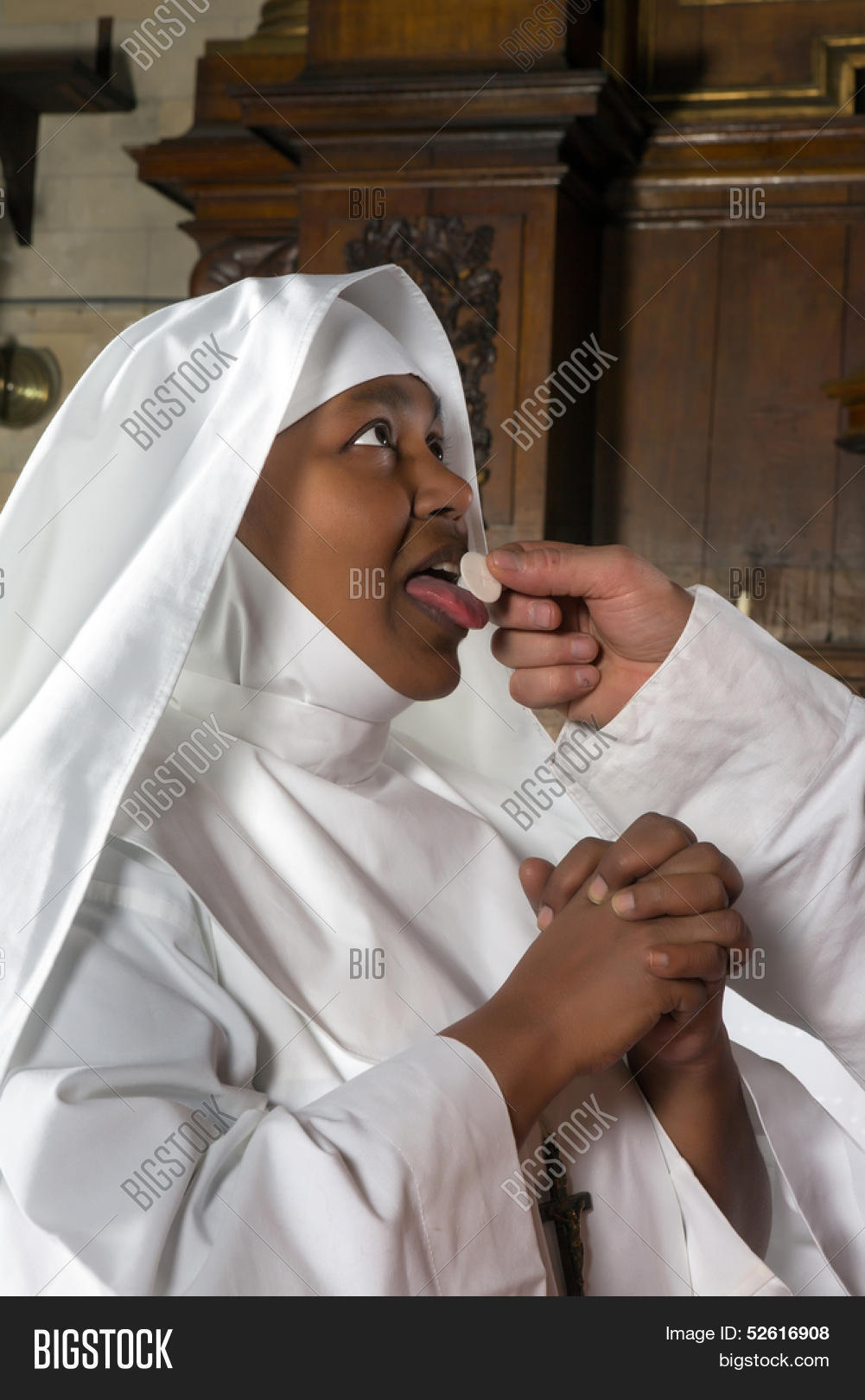 Nun Receiving Holy Image & Photo (Free Trial) | Bigstock