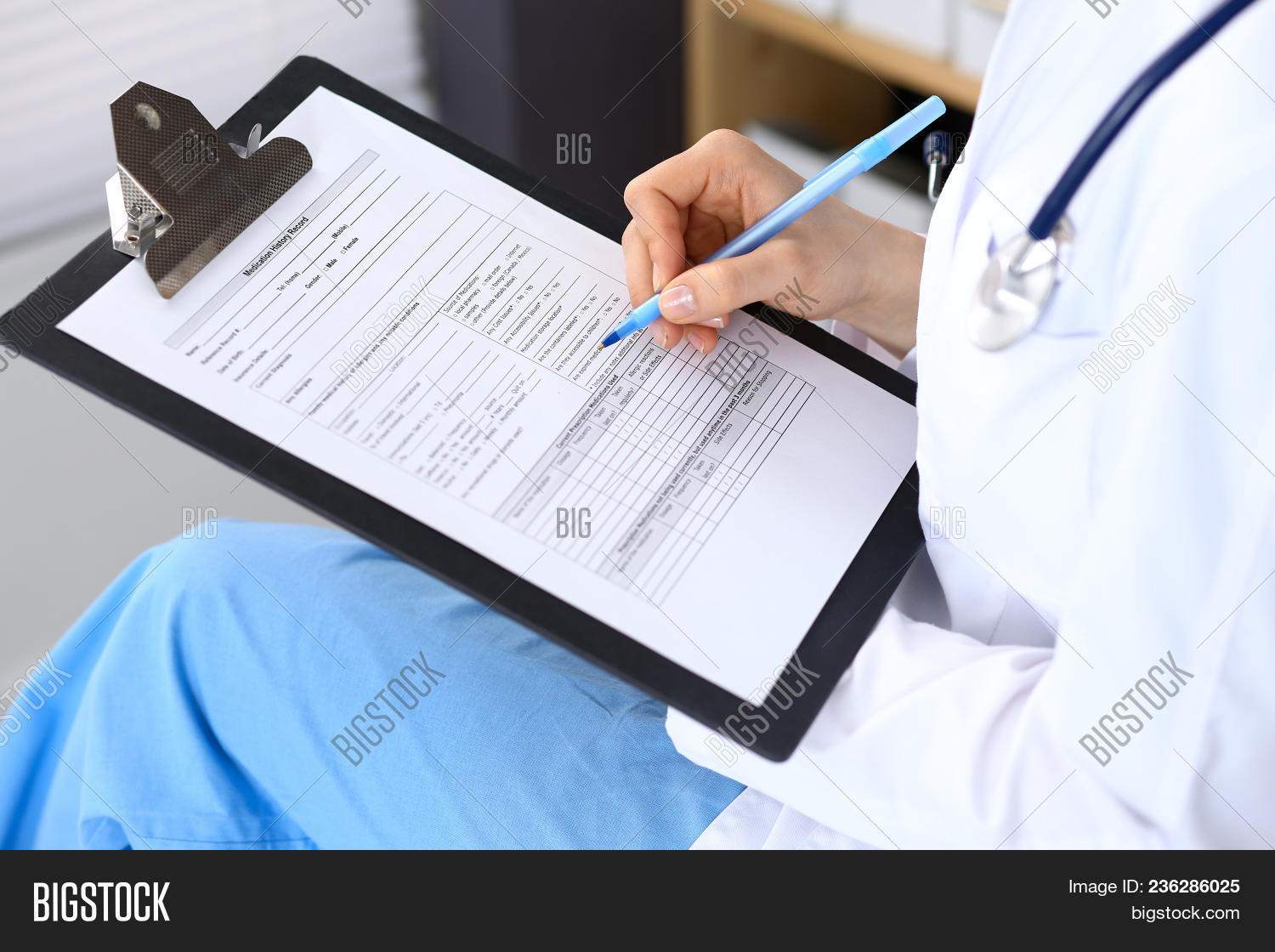 Female Doctor Filling Image & Photo (Free Trial) | Bigstock