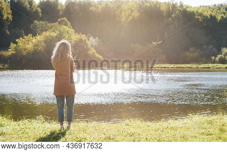 Loneliness, Relaxation, Contemplation Of Nature Concept. Back View Of ...