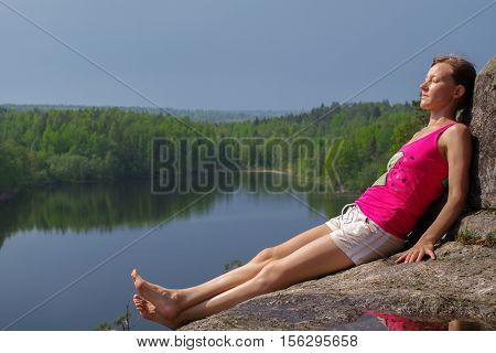 Woman Laying On Cliff Image & Photo (Free Trial) | Bigstock