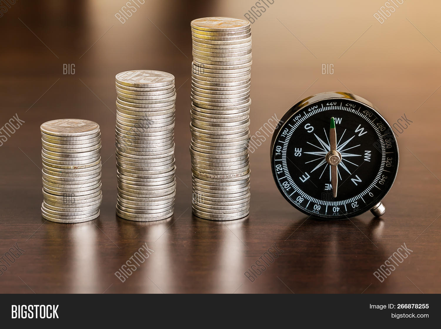 Stack Coins Compass On Image & Photo (Free Trial) | Bigstock