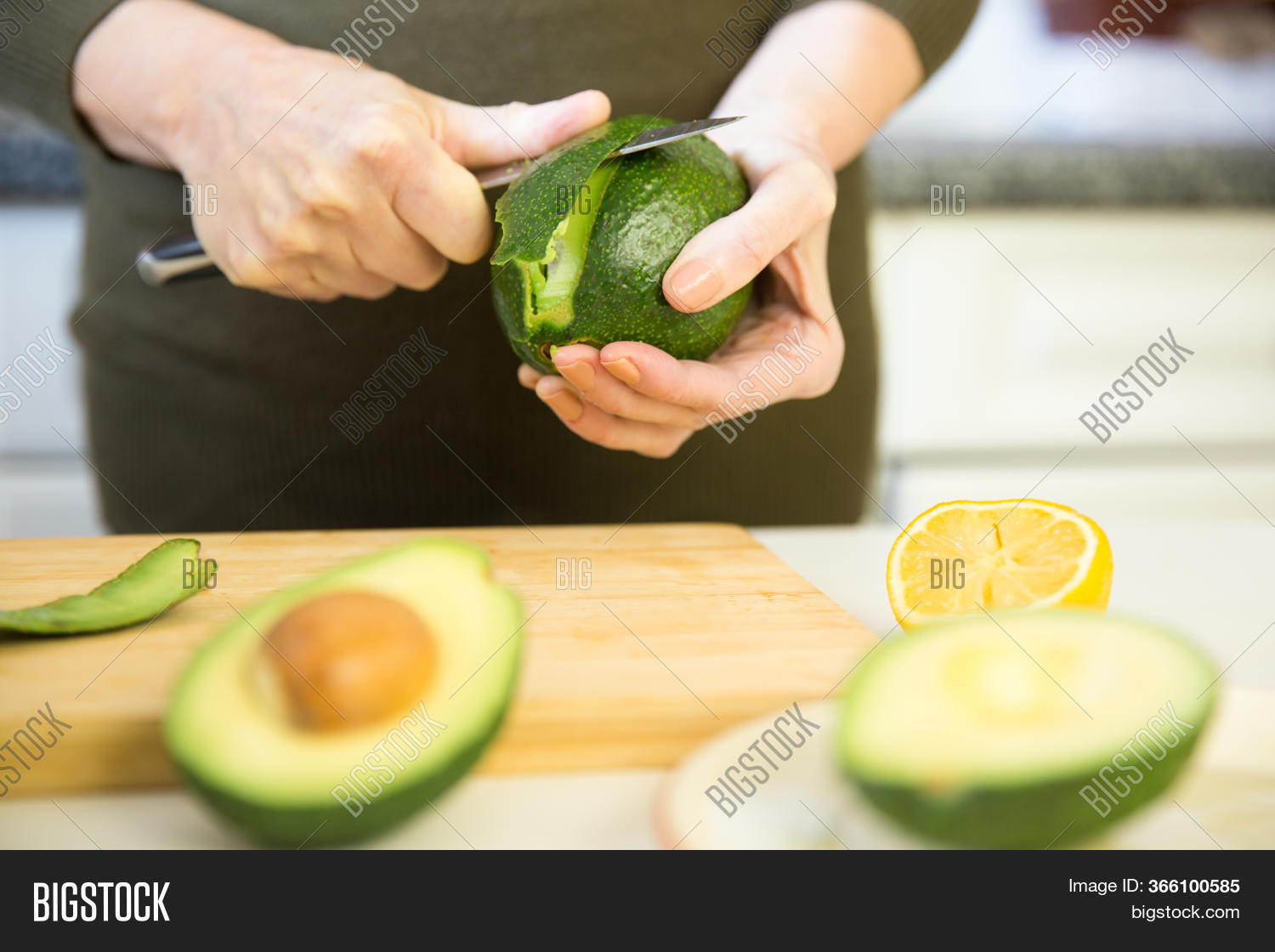 Woman Peeling Avocado Image & Photo (Free Trial) | Bigstock