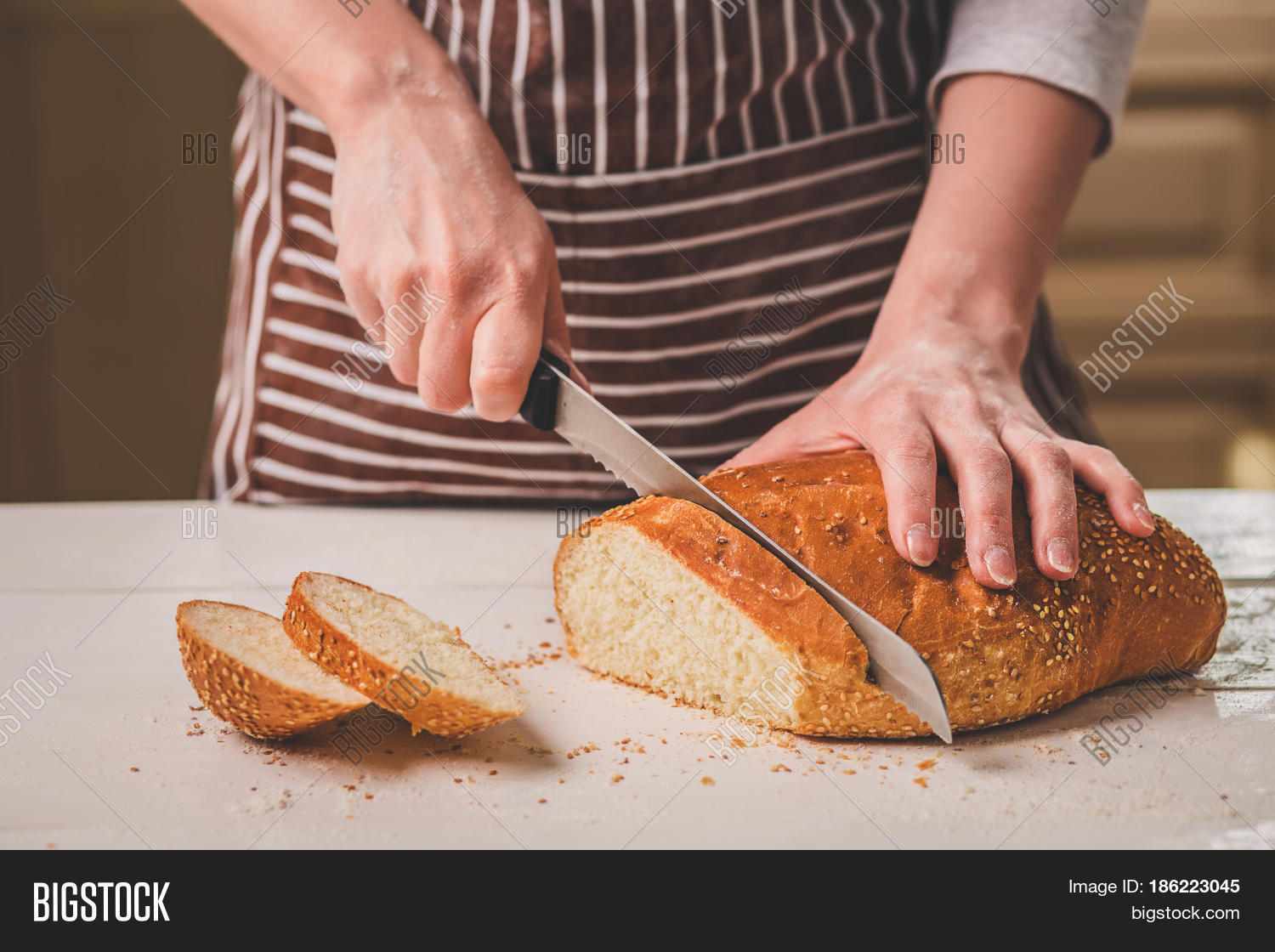 Woman Cutting Bread On Image & Photo (Free Trial) | Bigstock