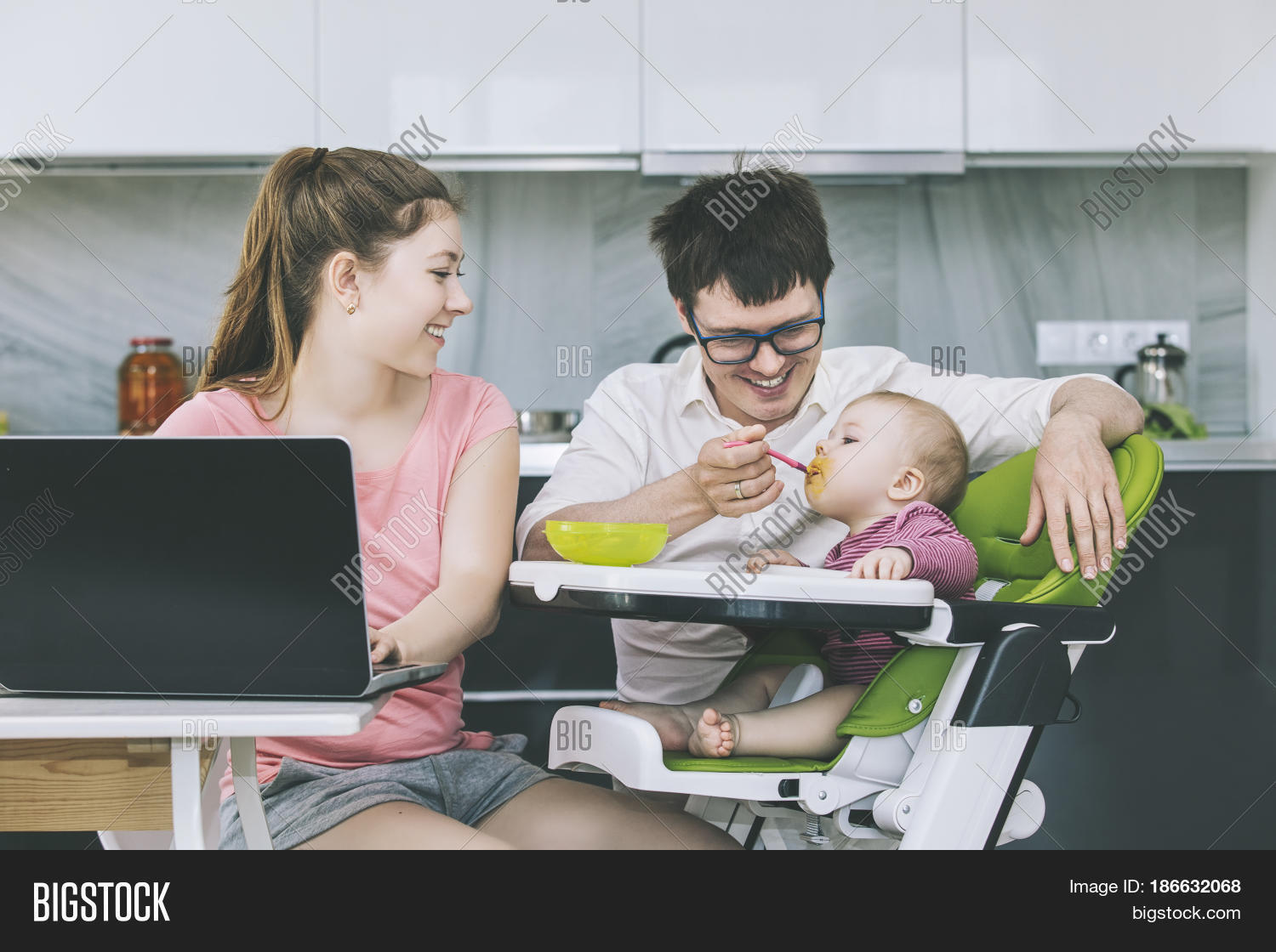 Family Mom Dad Feeding Image & Photo (Free Trial) | Bigstock