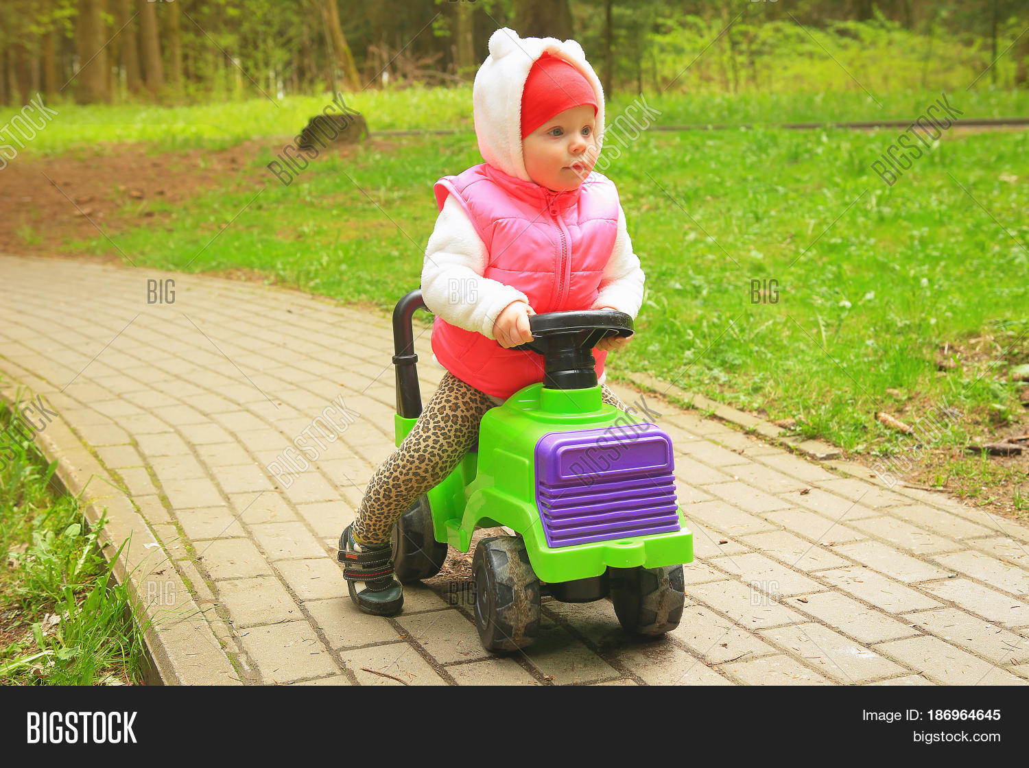 Little Girl Riding On Image & Photo (Free Trial) | Bigstock