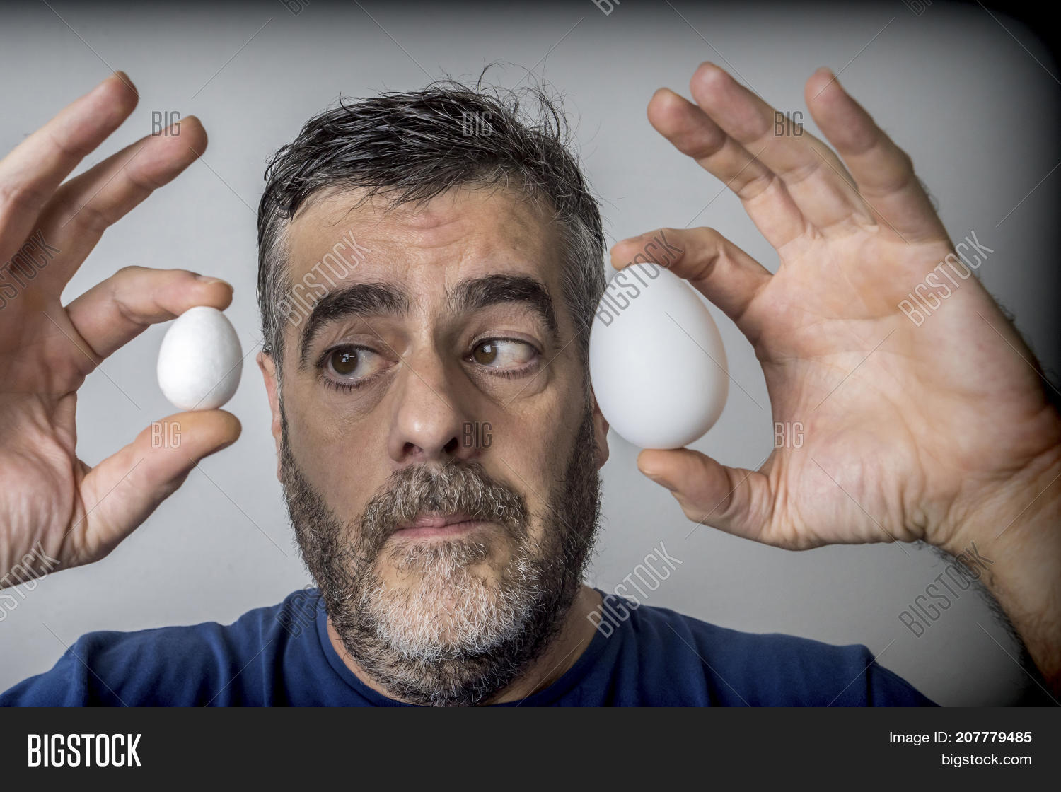 Man Compares Image & Photo (Free Trial) | Bigstock