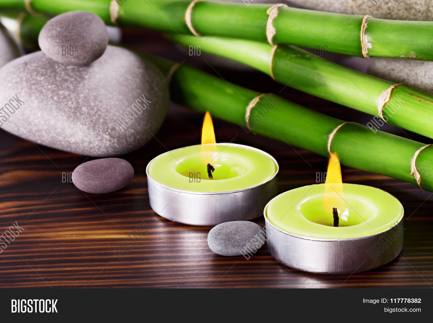 Spa Background With Stacked Massage Stones And Bamboo