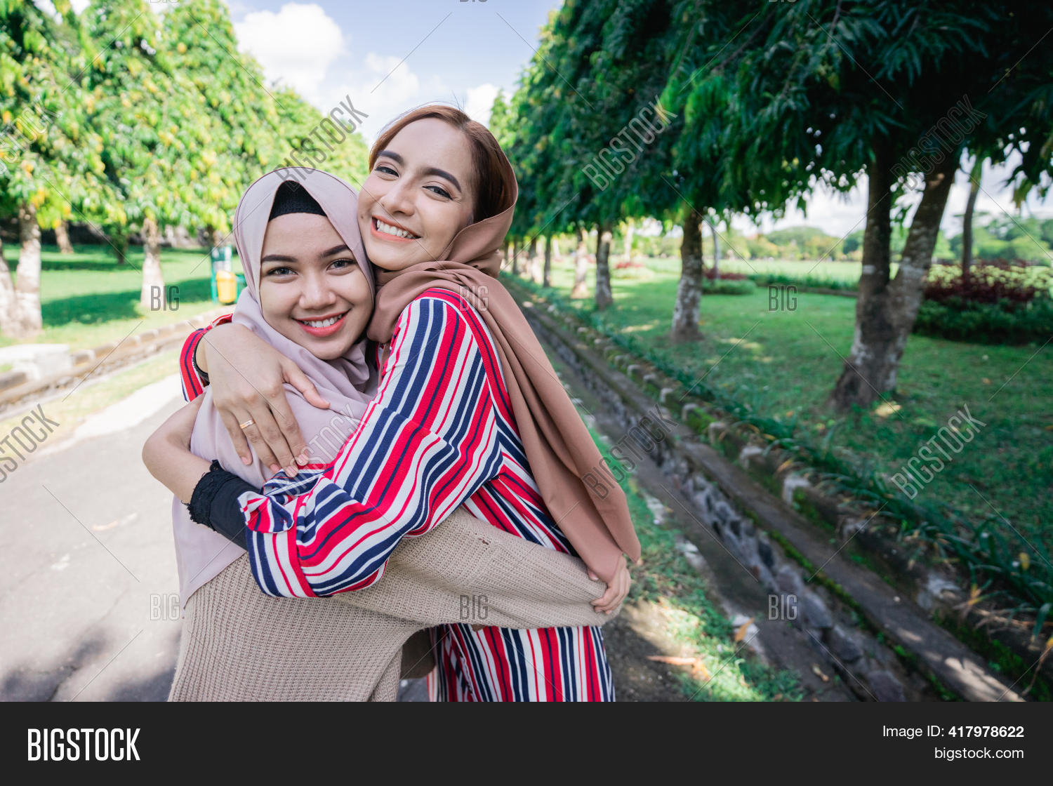 Two Girls Hug On Image & Photo (Free Trial) | Bigstock
