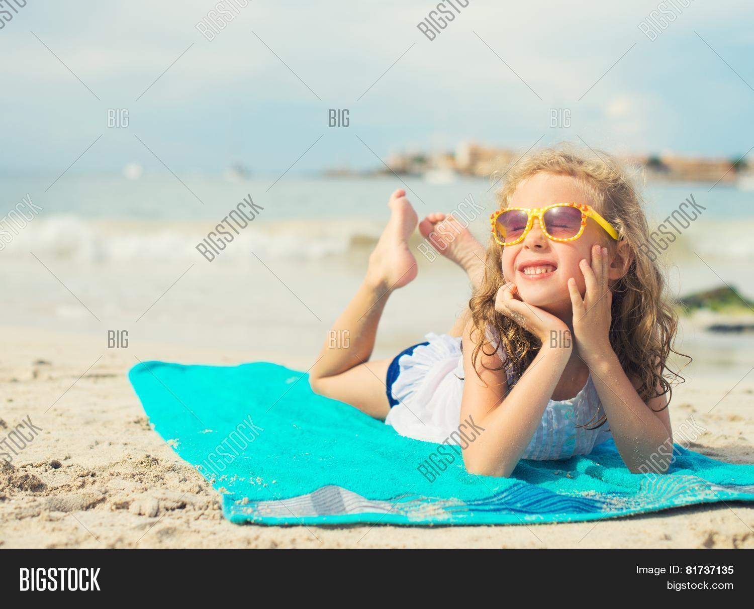 Little Girl Sunbathing Image & Photo (Free Trial) | Bigstock