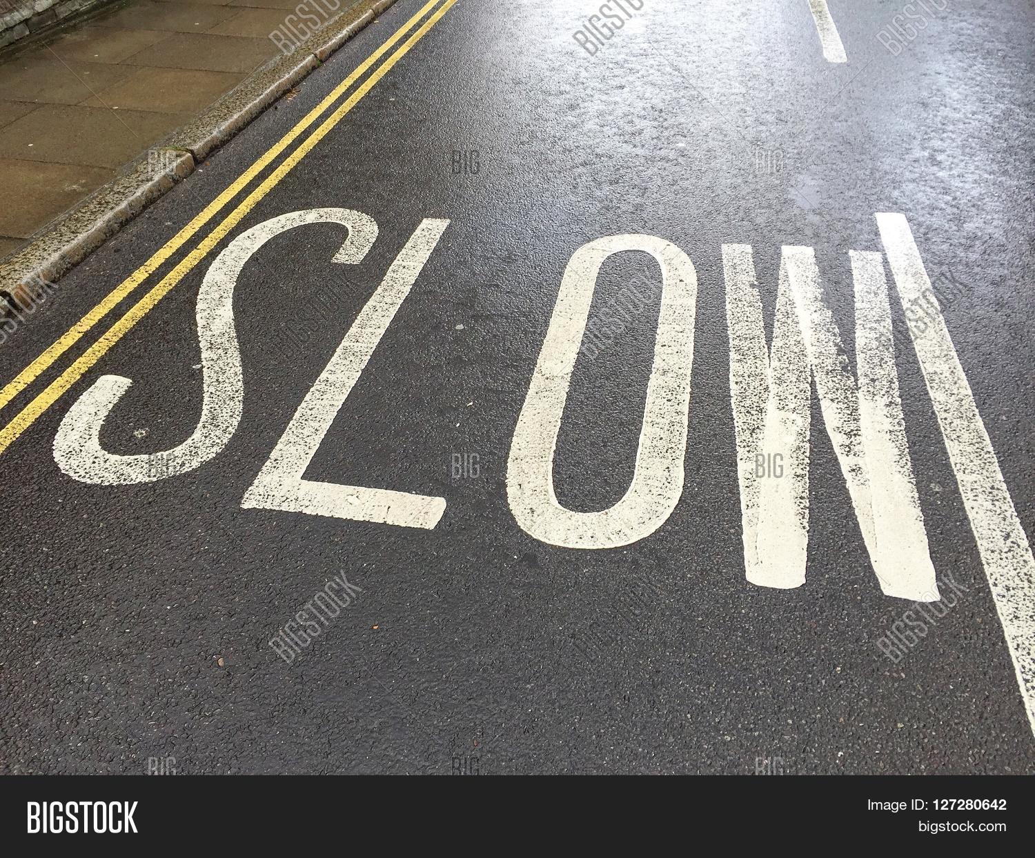 Slow Road Marking Image & Photo (Free Trial) | Bigstock
