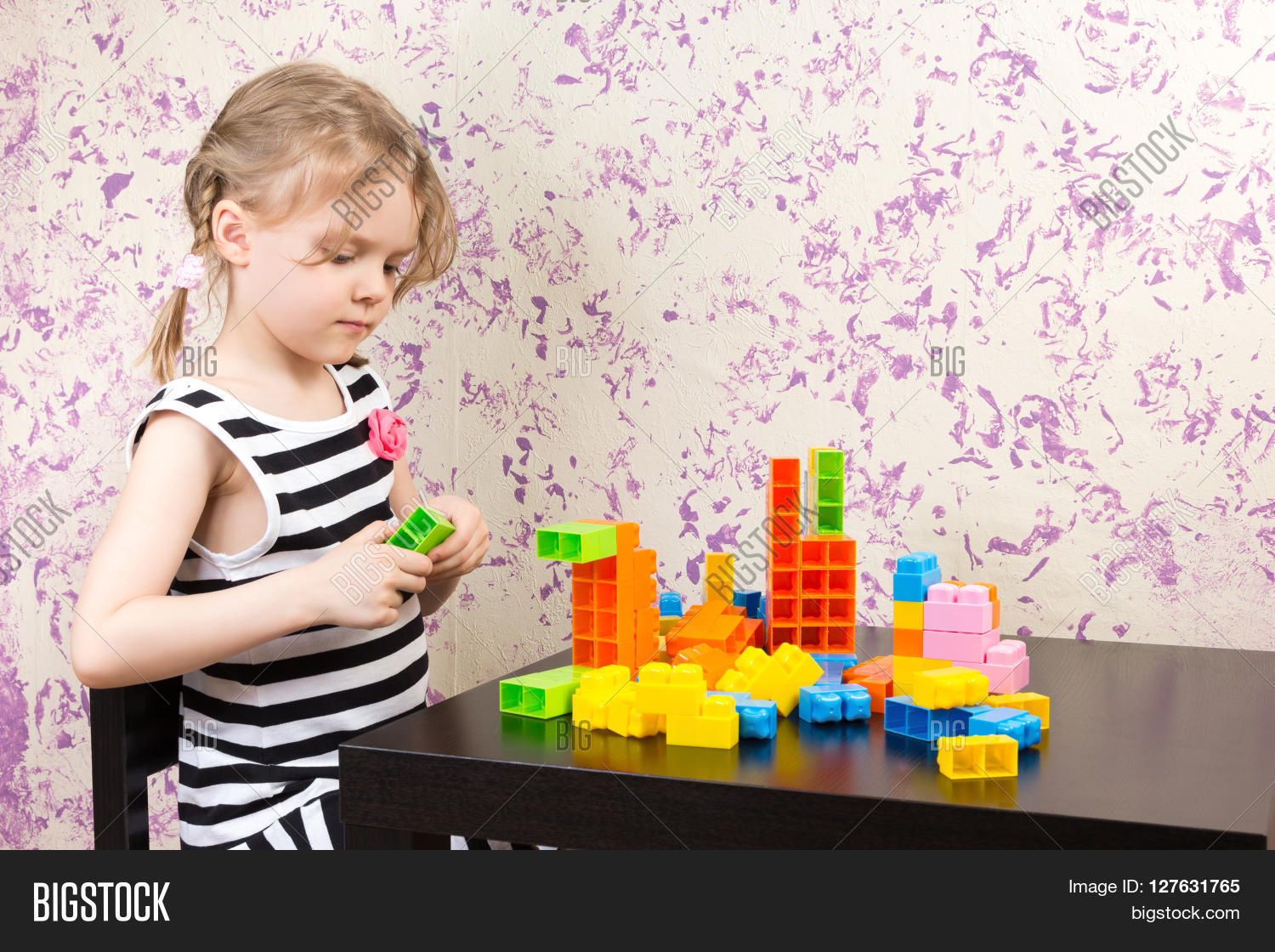 Little Girl Builds Image & Photo (Free Trial) | Bigstock