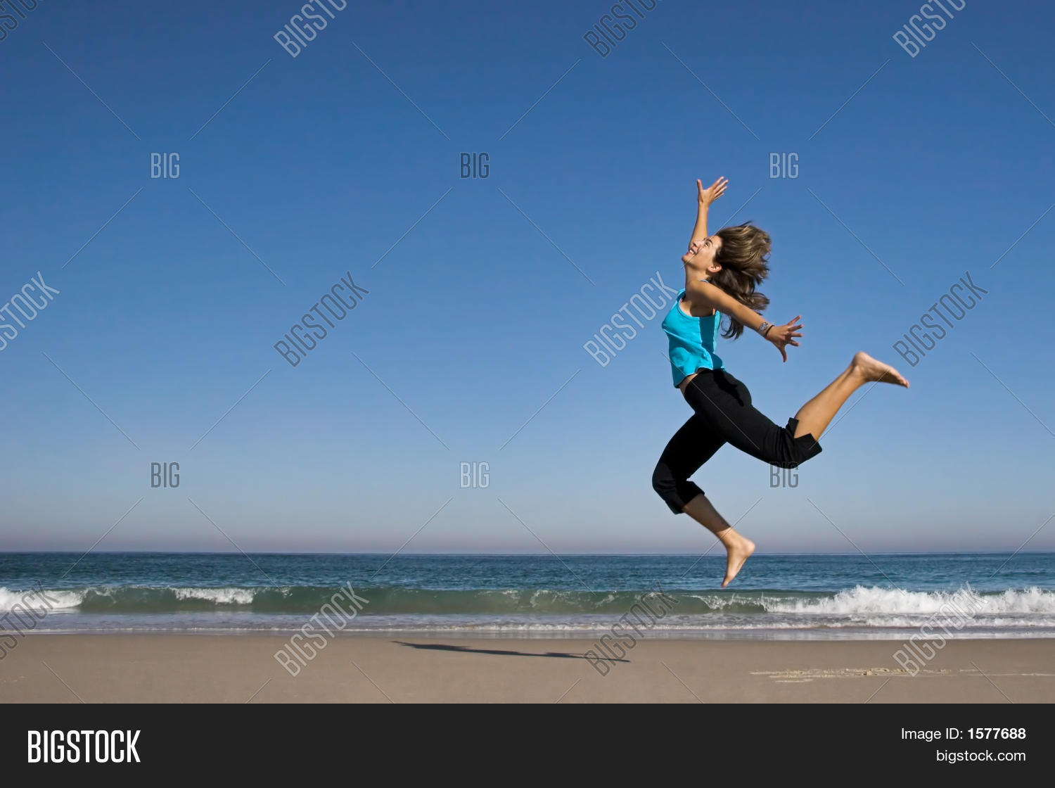 Jumping On Beach Image & Photo (Free Trial) | Bigstock