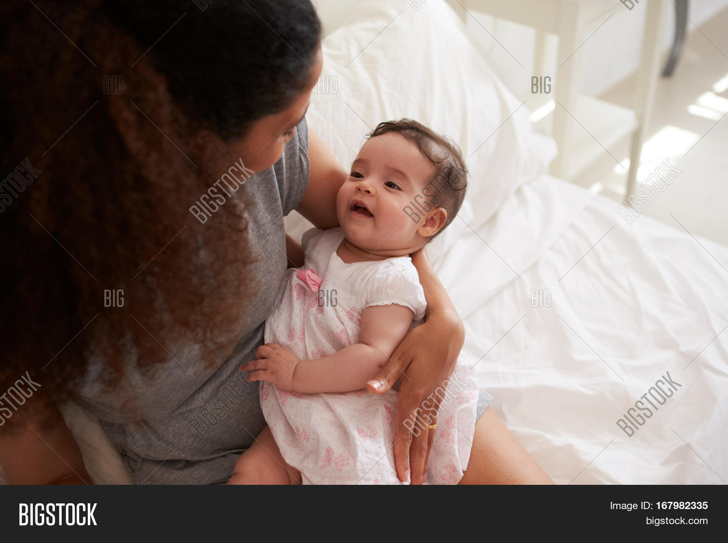 Mother Cuddling Baby Image & Photo (Free Trial) | Bigstock