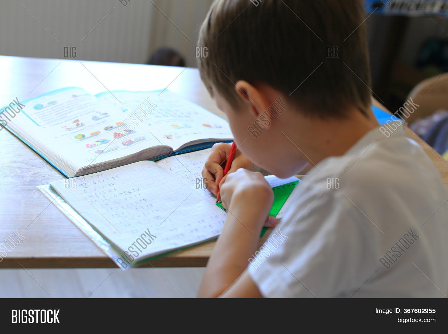 Child Does Homework On Image & Photo (Free Trial) | Bigstock