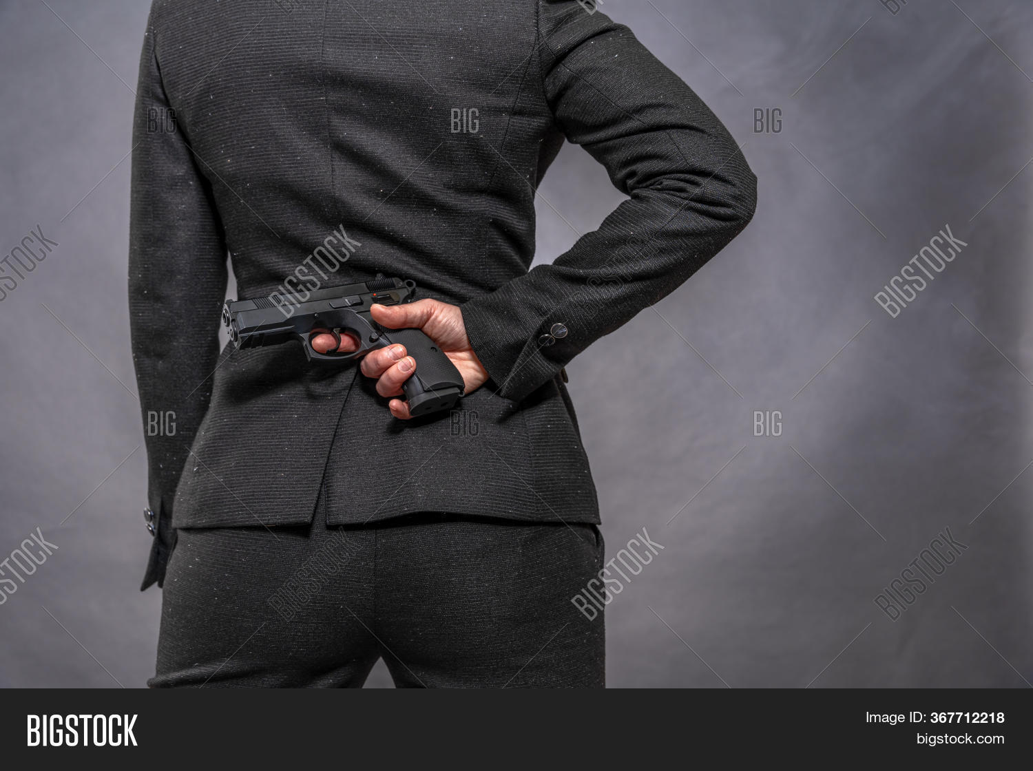 Gun Hand Behind Back Image & Photo (Free Trial) | Bigstock