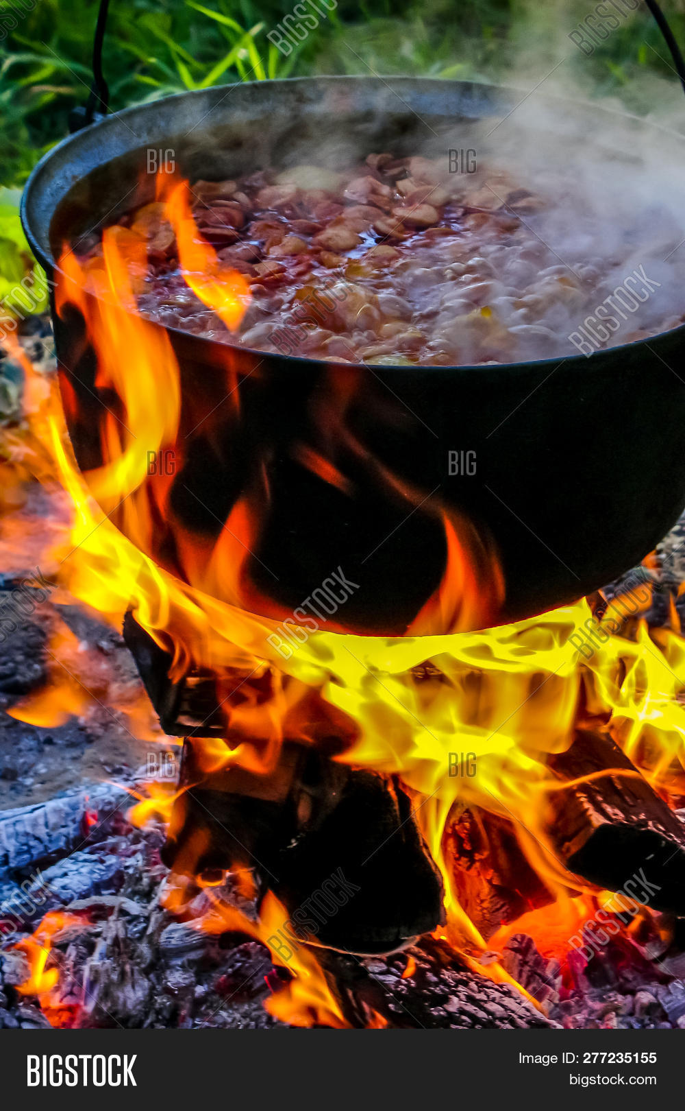 Cooking Pot On Fire