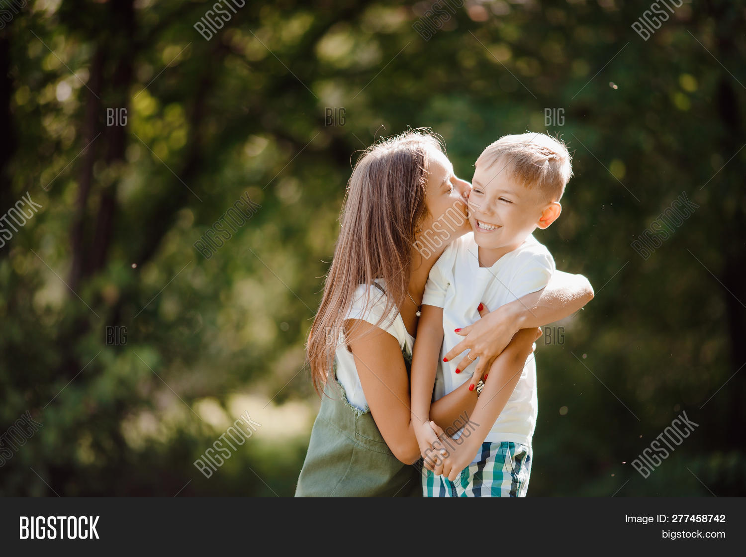 Brother And Sister Hugging