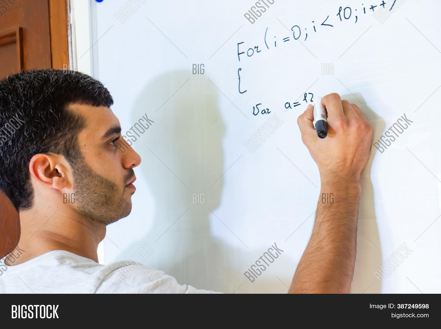 Young Man Writing On Image & Photo (Free Trial) | Bigstock