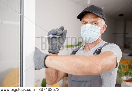 Worker Man Installs Image & Photo (Free Trial) | Bigstock
