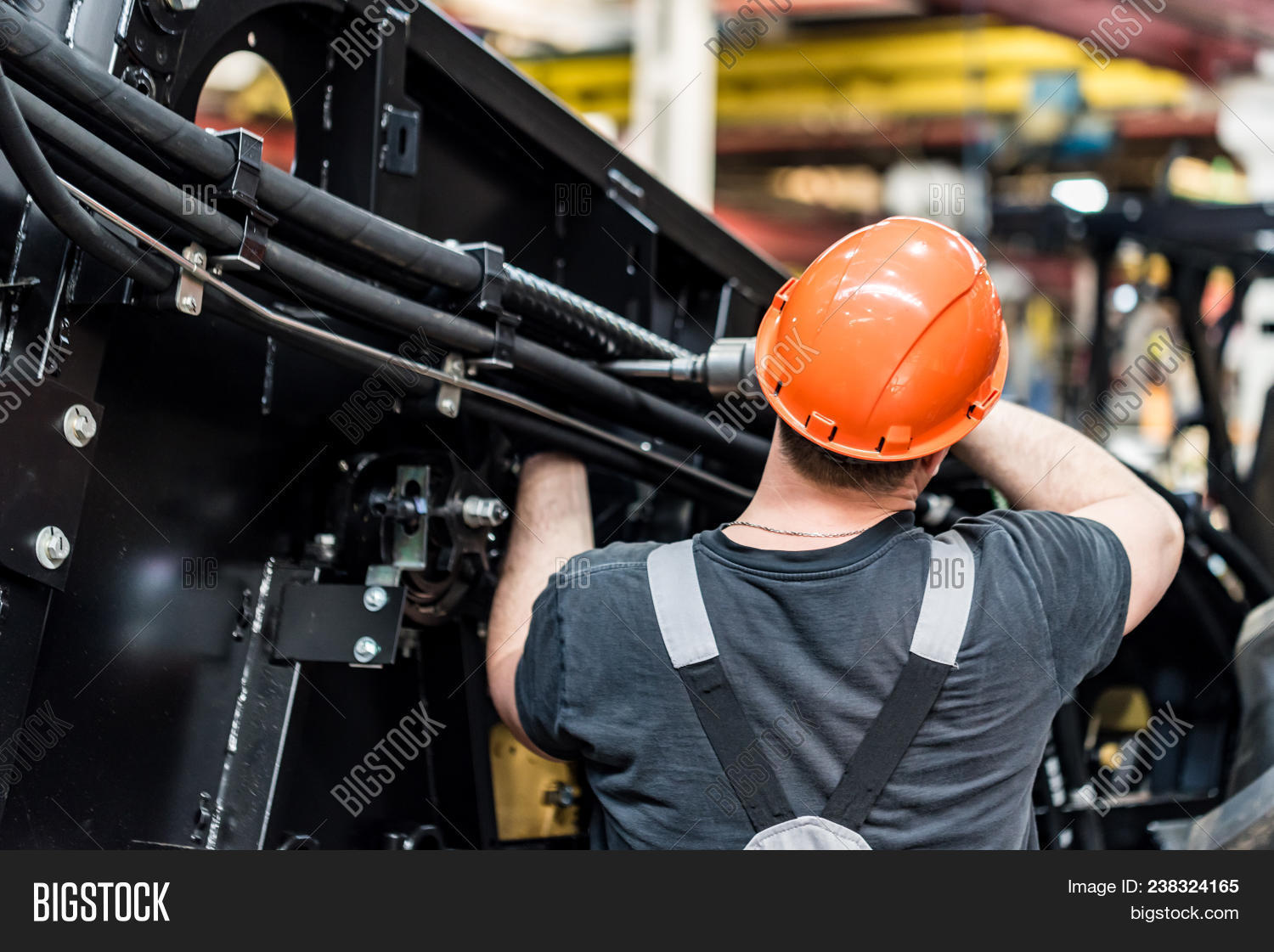 Worker Assembles Image & Photo (Free Trial) | Bigstock