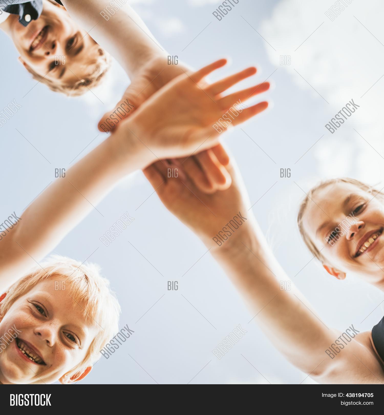 Kids Stacking Hands Image & Photo (Free Trial) | Bigstock