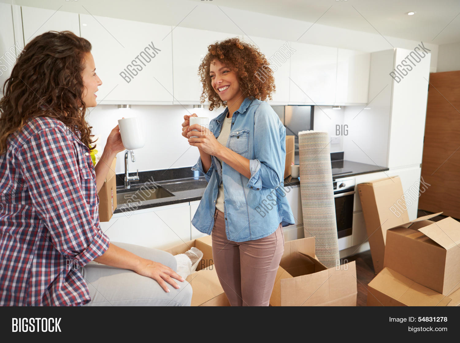 Two Women Moving Into Image & Photo (Free Trial) | Bigstock