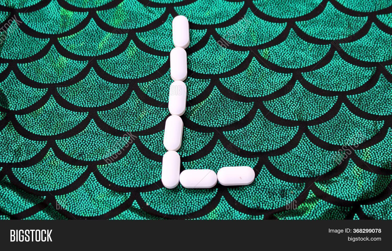 Alphabet Made Pills On Image & Photo (Free Trial) | Bigstock