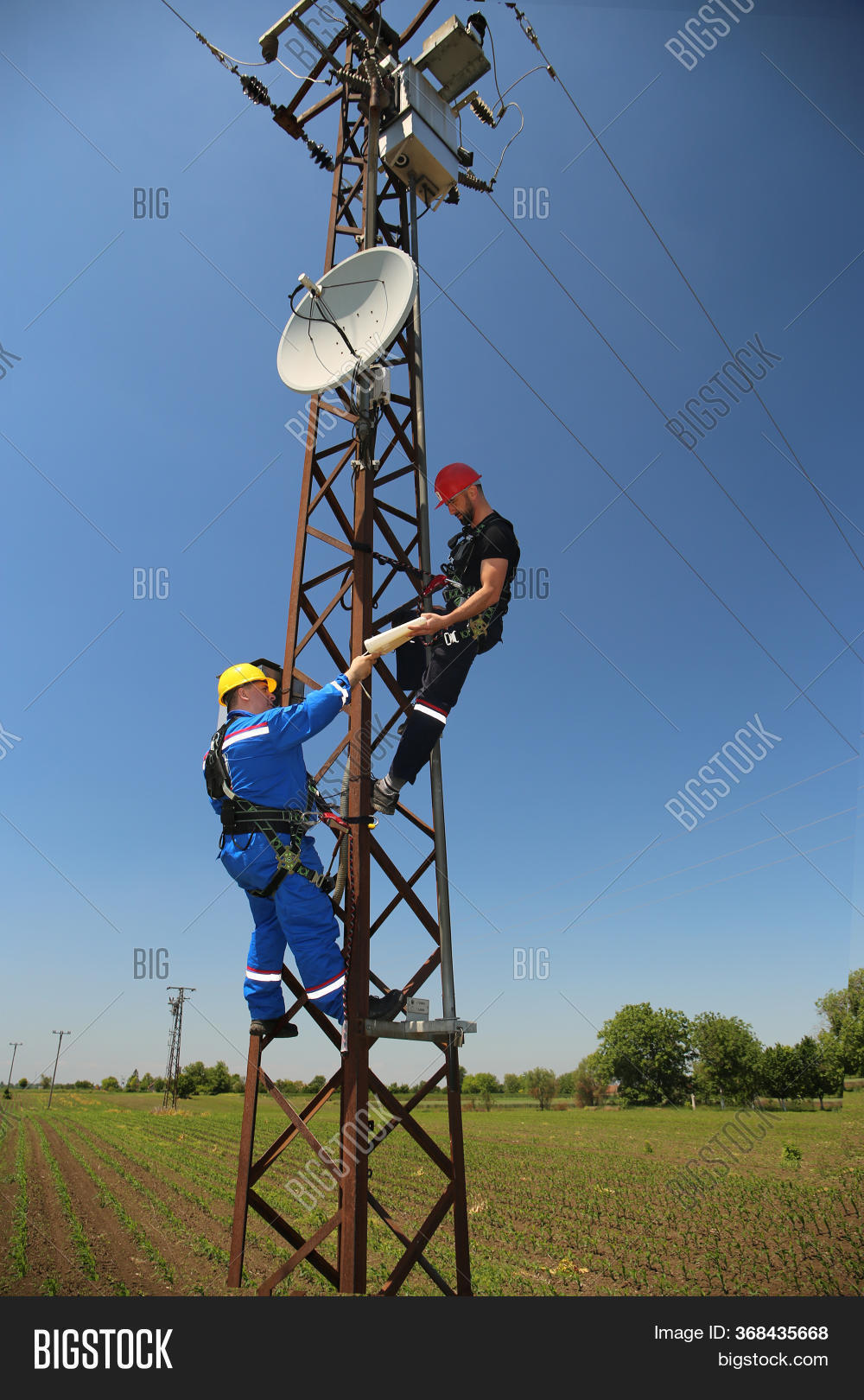 Two Workers Working On Image & Photo (Free Trial) | Bigstock