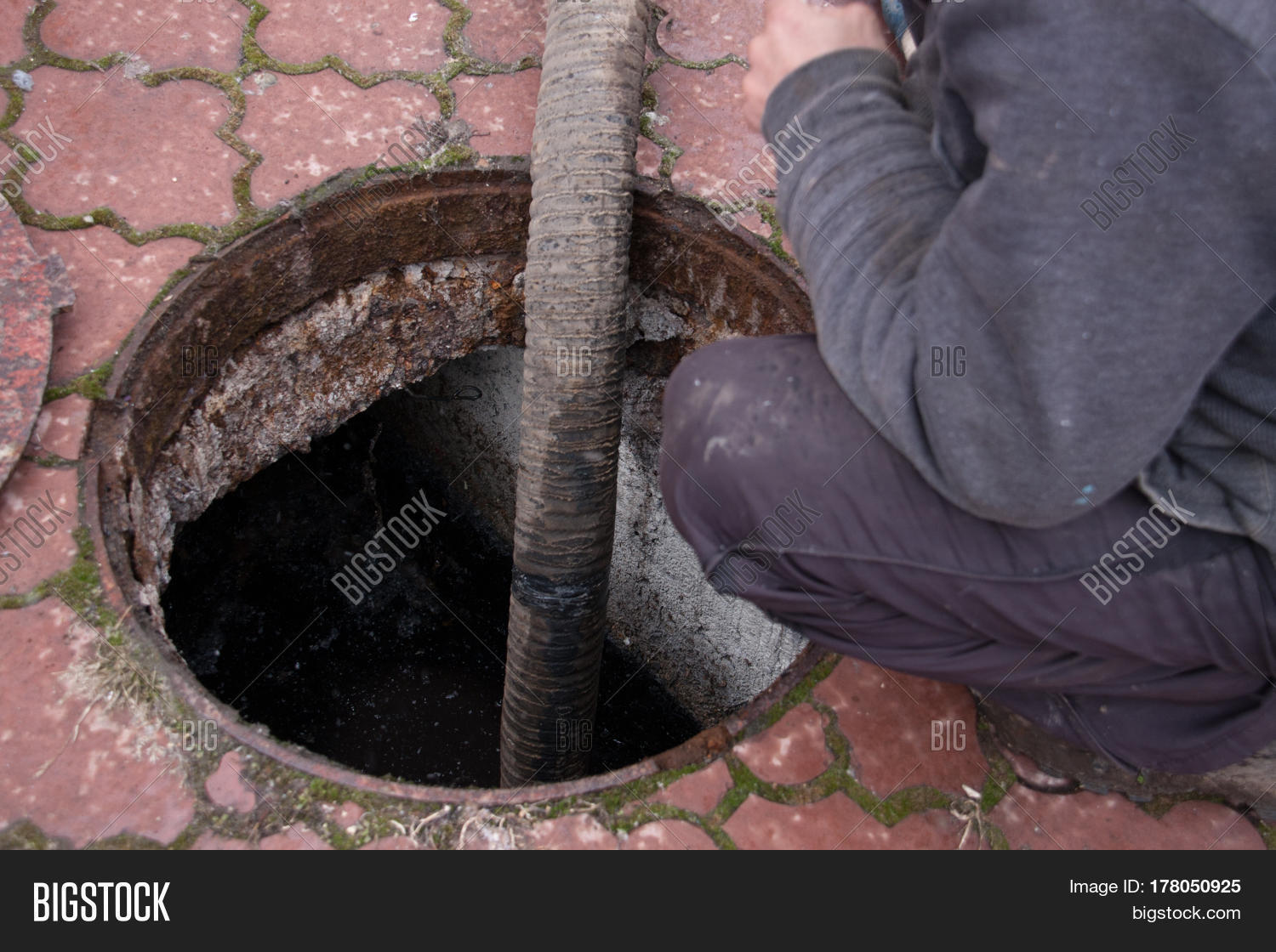 Man Pumping Sewage Image & Photo (Free Trial) | Bigstock