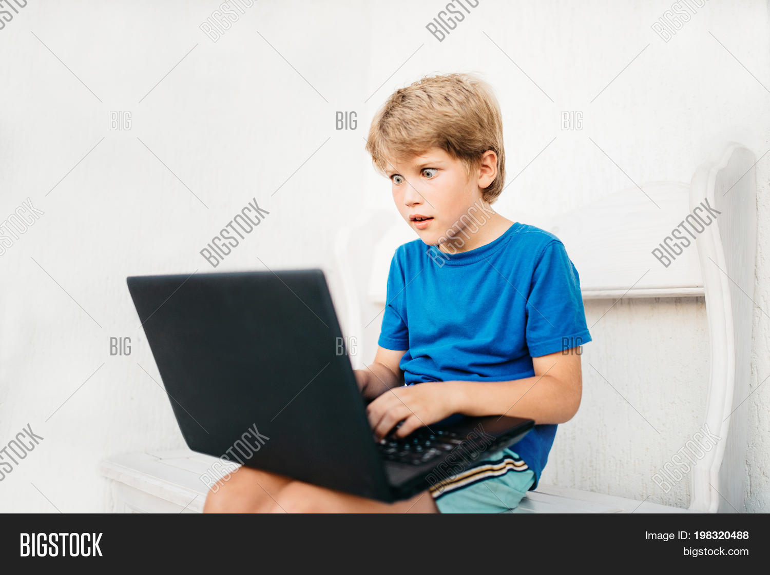 Boy Uses Laptop Looks Image & Photo (Free Trial) | Bigstock