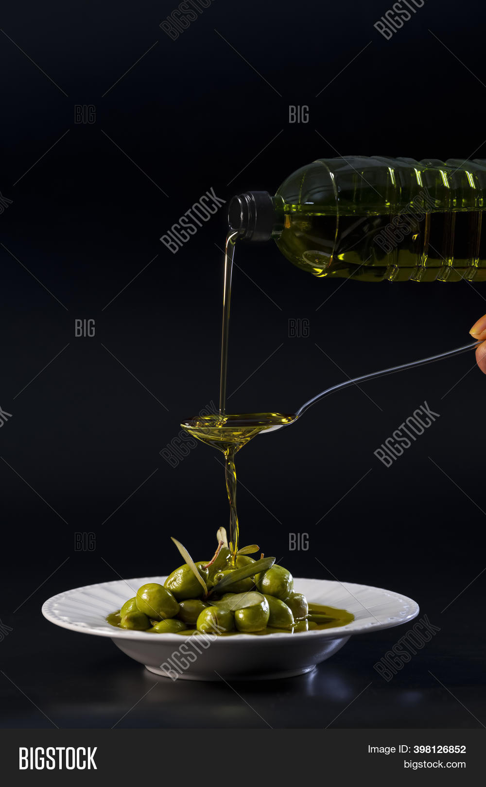Olive Oil Being Poured Image & Photo (Free Trial) | Bigstock
