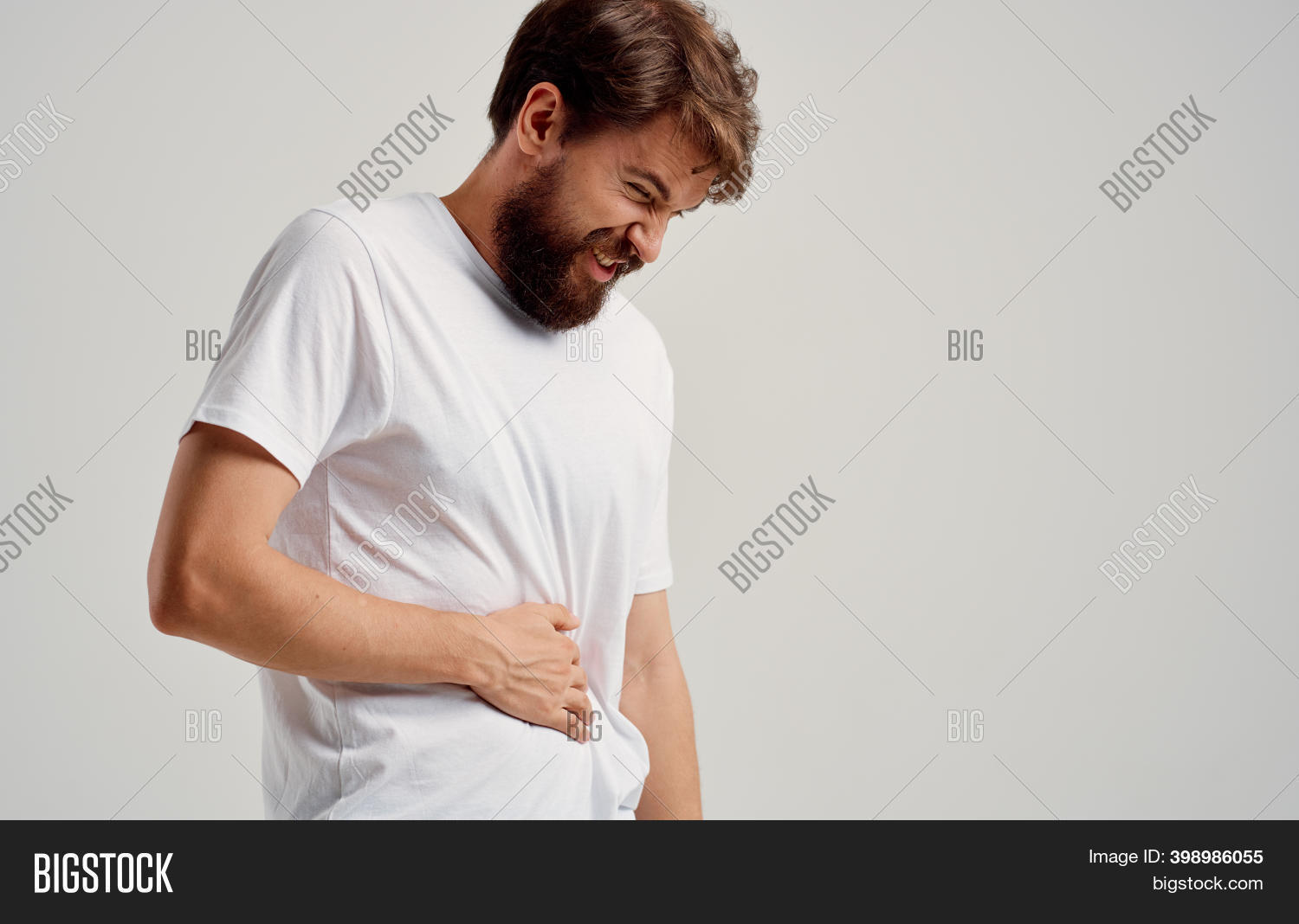 Man Touching Stomach Image & Photo (Free Trial) | Bigstock