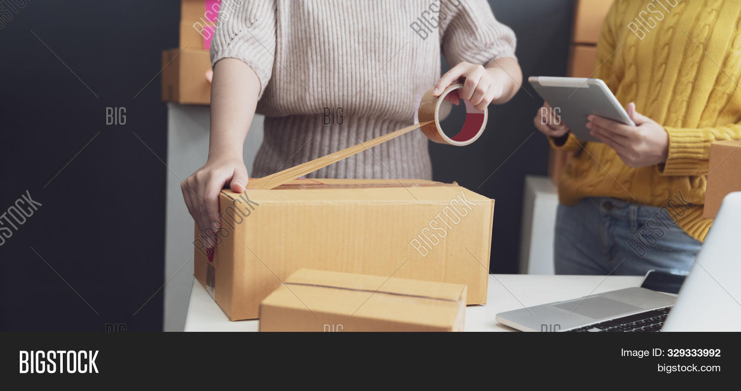 Women Packing Parcels Image & Photo (Free Trial) | Bigstock