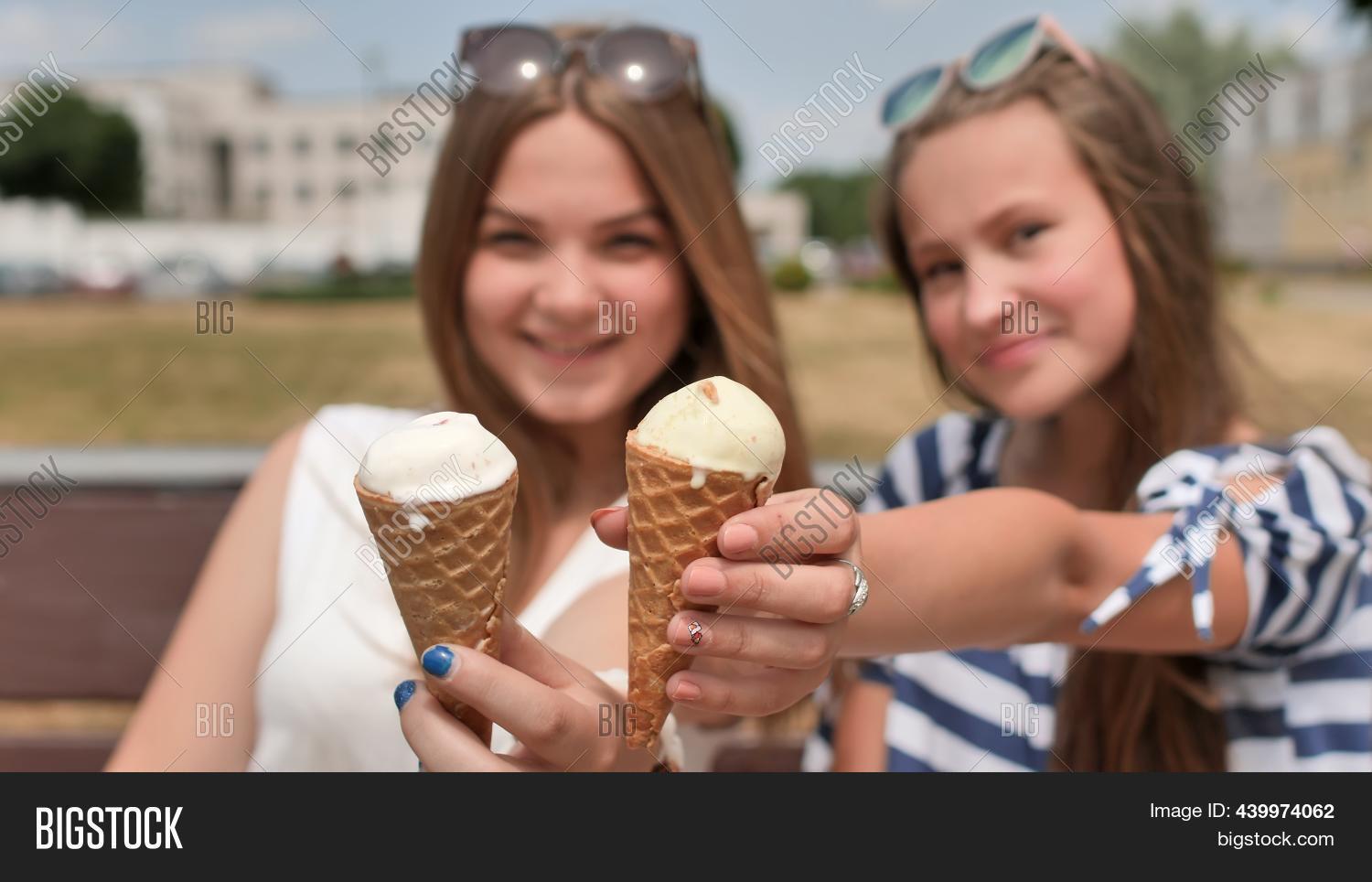 Two Girls Presenting Image & Photo (Free Trial) | Bigstock