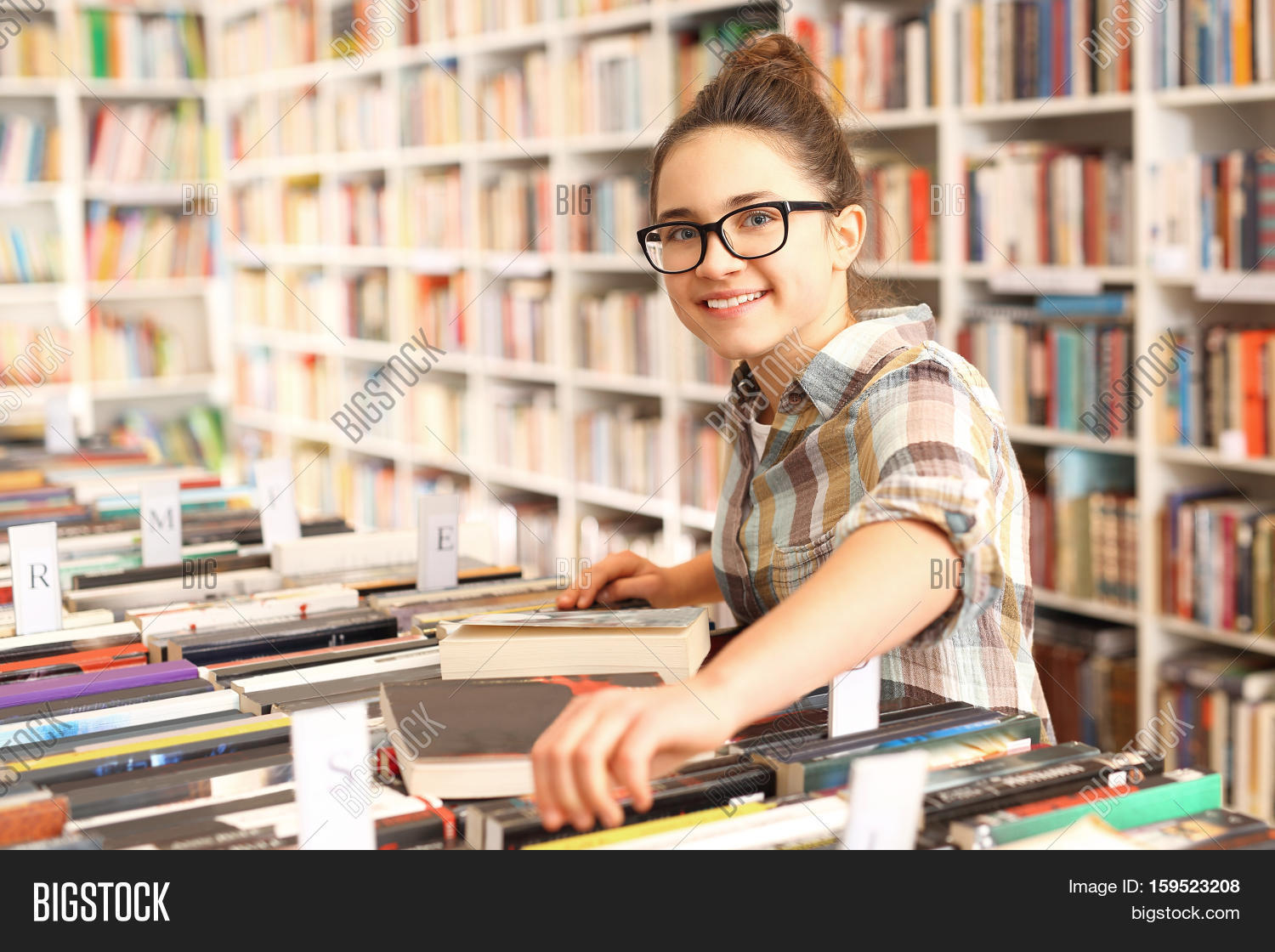 Girl Bookstore Chooses Image & Photo (Free Trial) | Bigstock
