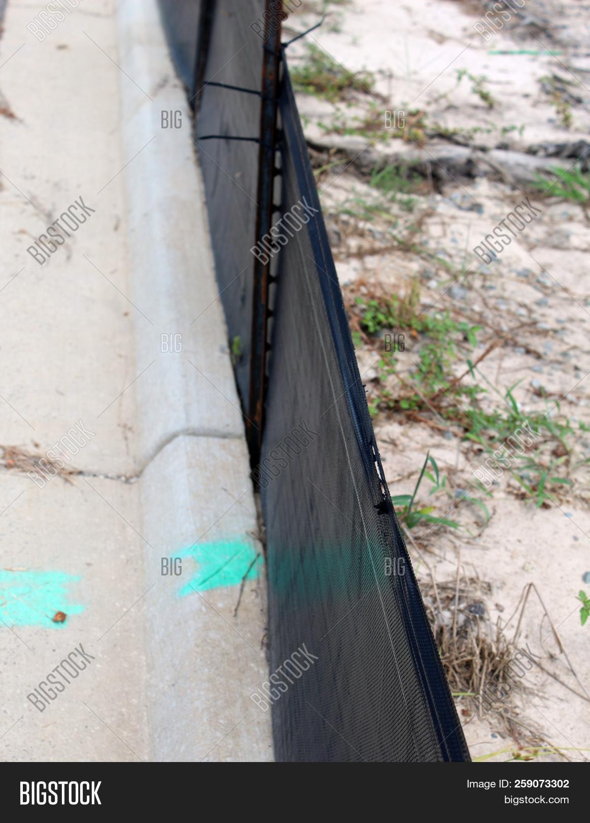 Sidewalk Black Silt Image & Photo (Free Trial) | Bigstock