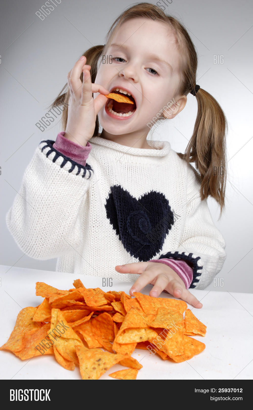 Little Girl Eating Image & Photo (Free Trial) | Bigstock