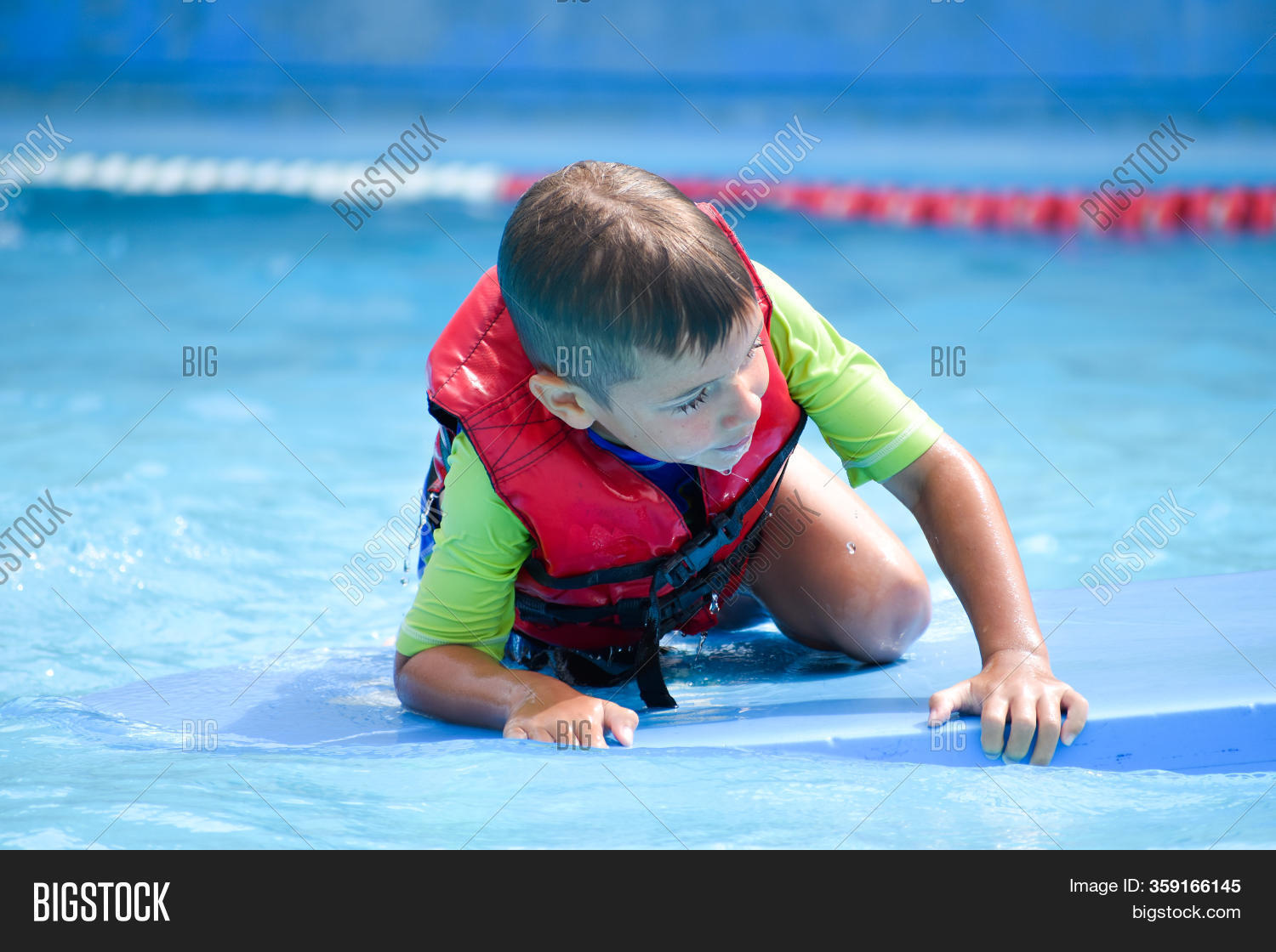 Boy Life Jacket Water Image & Photo (Free Trial) | Bigstock